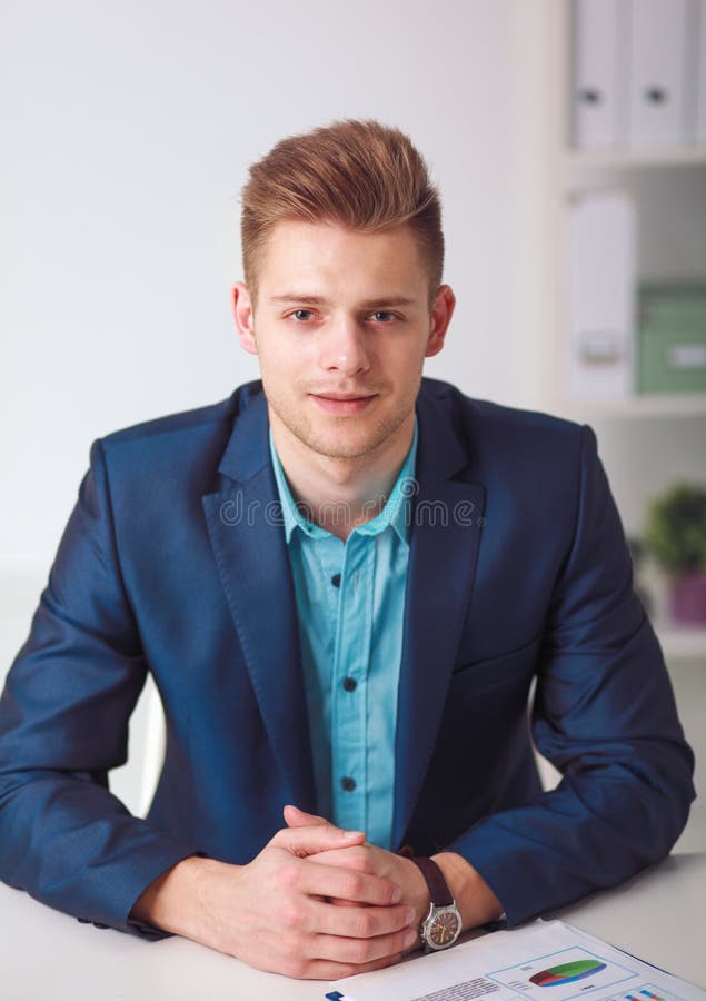 Handsome Young Man Sitting and Working on Laptop Computer Stock Image ...