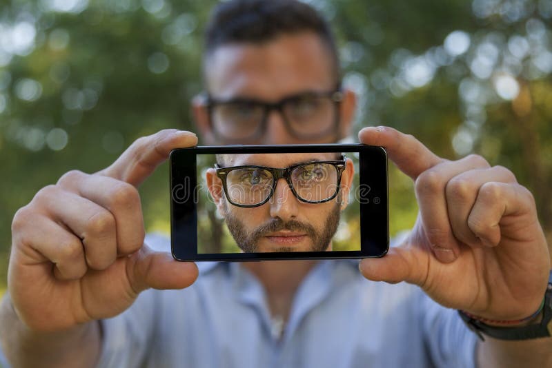 Handsome Young Man Take a Selfie with Smart Phone Stock Photo - Image ...