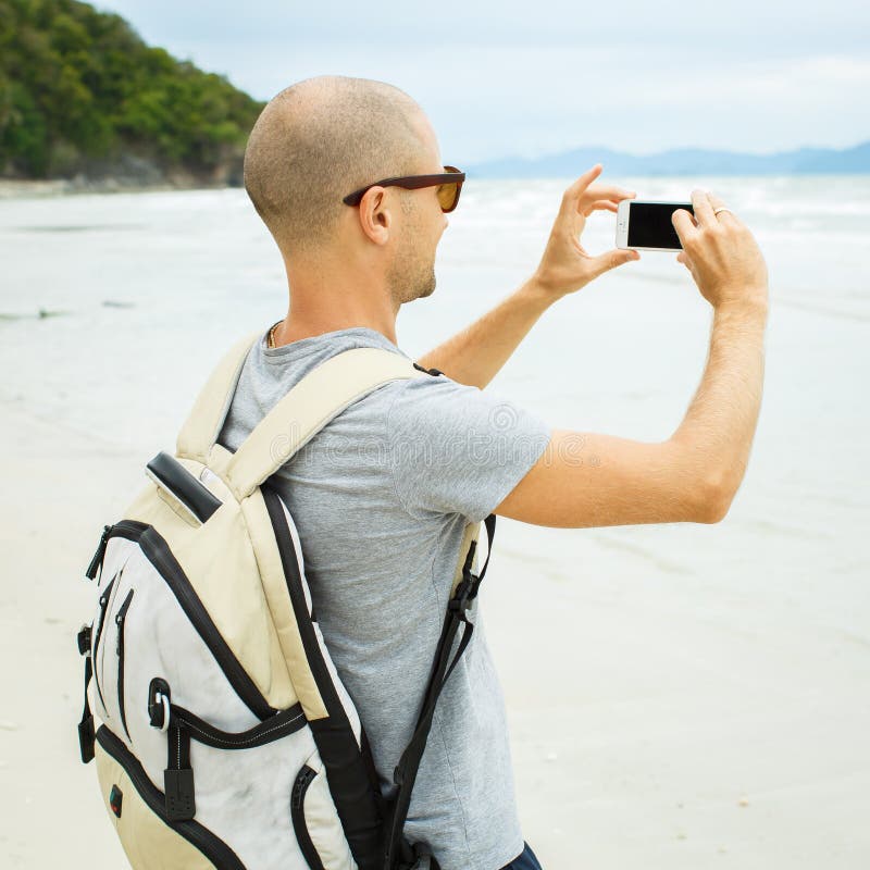 Handsome Young Man Taking Photo with Cell Phone Stock Image - Image of ...