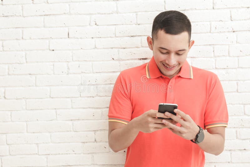 Man texting on mobilephone stock image. Image of success - 46926585
