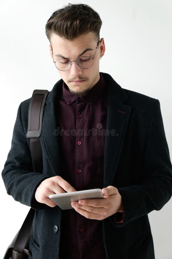 Handsome Young Man Using His Digital Tablet. Isolated on White Stock ...