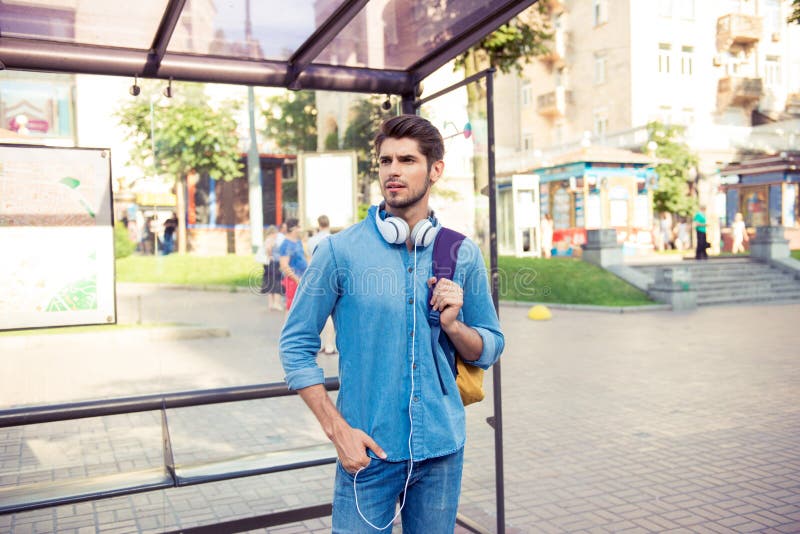 Handsome Young Man Waiting His Bus at Bus Stop Stock Image - Image of ...