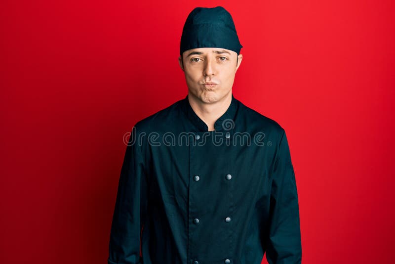Handsome Young Man Wearing Professional Cook Uniform and Hat Depressed ...