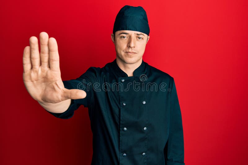 Handsome Young Man Wearing Professional Cook Uniform and Hat Doing Stop ...