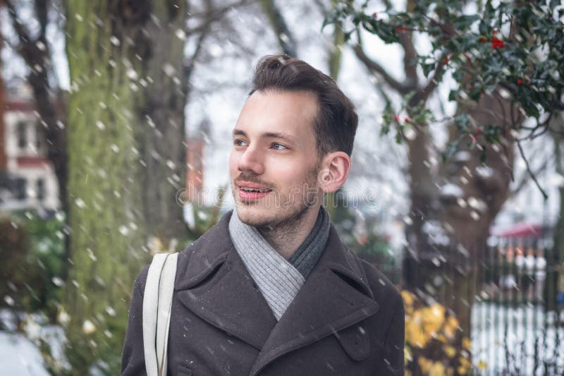 Portrait of a Handsome Young Caucasian Man in Winter Snow Stock Image ...