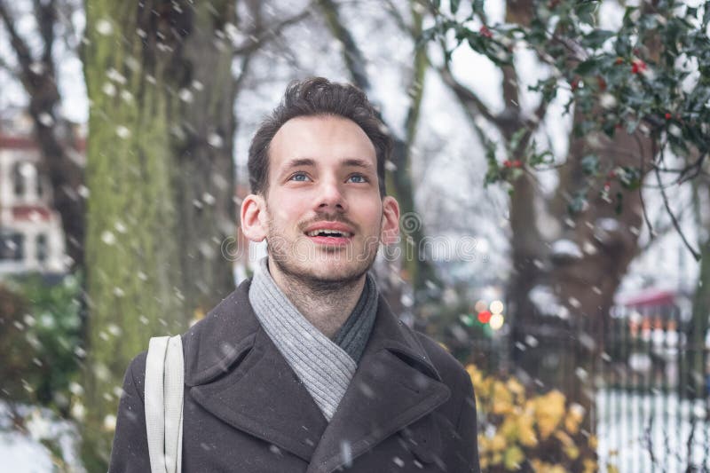 Portrait of a Handsome Young Caucasian Man in Winter Snow Stock Photo ...