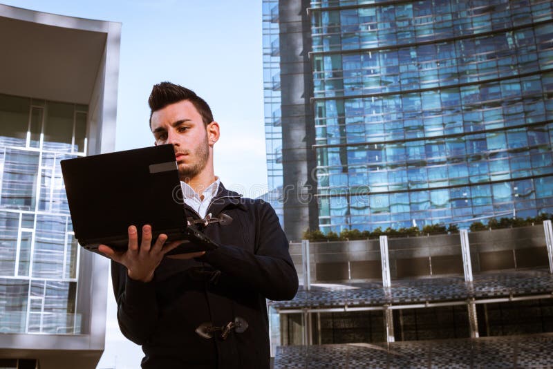 Handsome Young Man Working at Computer Stock Photo - Image of gaze ...