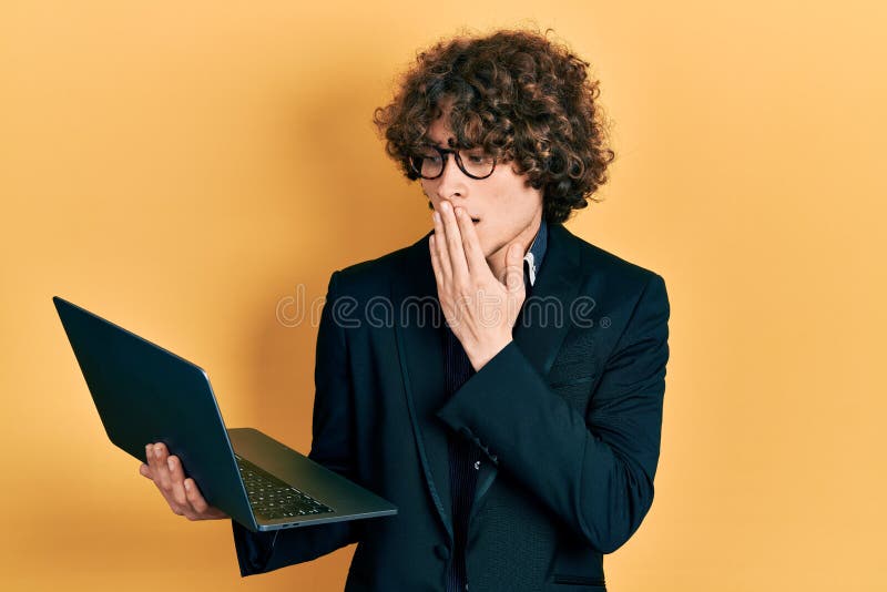 Handsome Young Man Working Using Computer Laptop Covering Mouth with ...