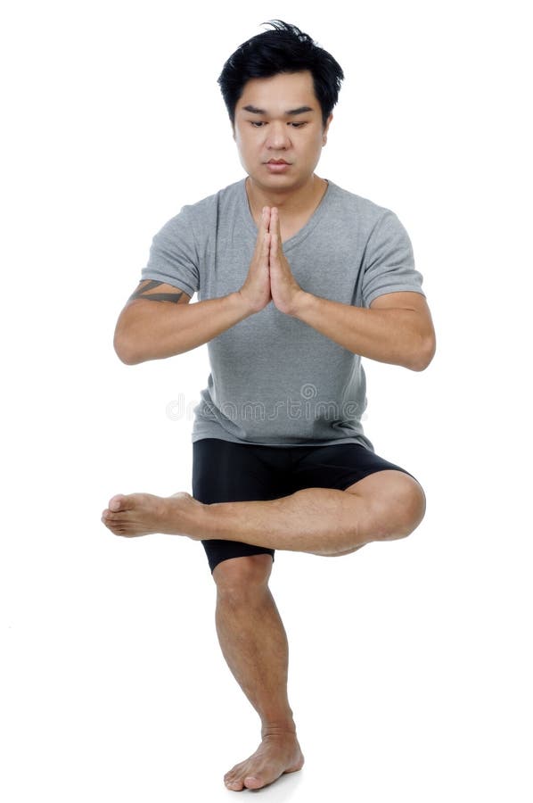 Handsome Young Man in Yoga Pose Stock Photo - Image of healthy, people ...