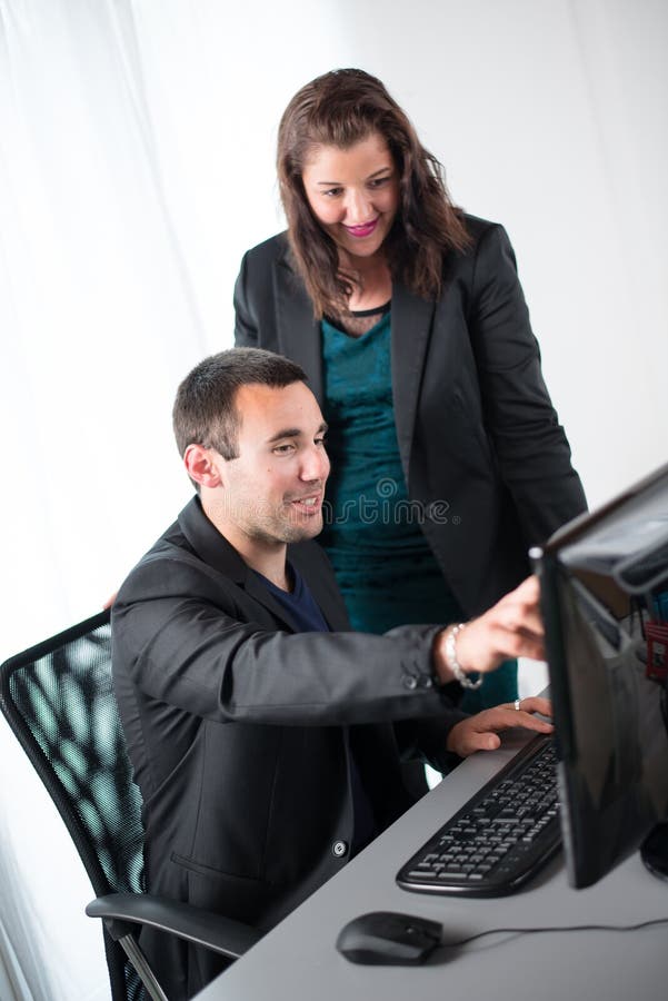 Handsome Young Manager with Her Assistant Stock Photo - Image of office ...
