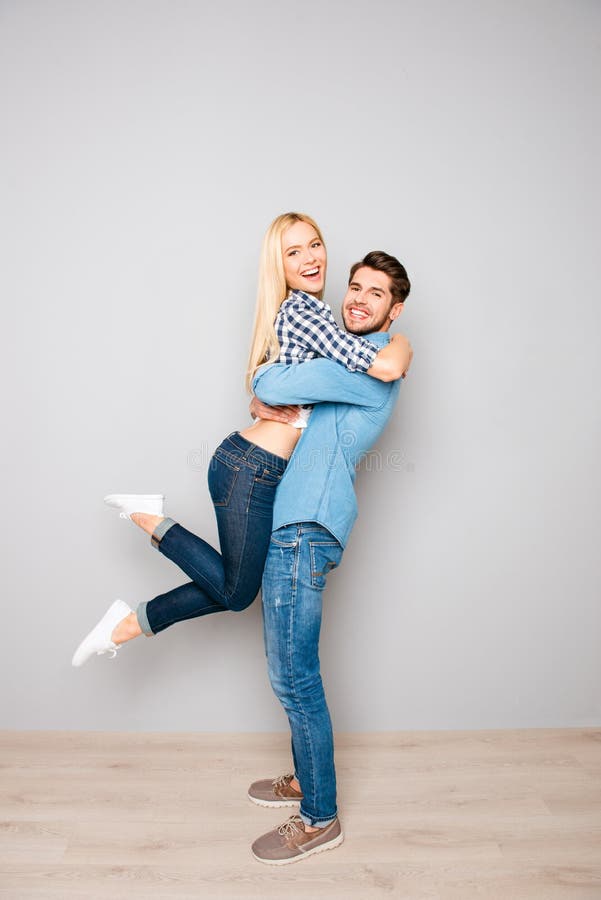 Handsome Young Man Carrying His Pretty Girlfriend Stock Image - Image ...