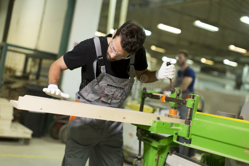 Handsome Young Men Working in Lumber Workshop Stock Image - Image of ...