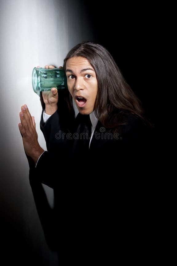 Handsome Young Mixed Race Man Using Glass To Eaves Stock Photo - Image ...