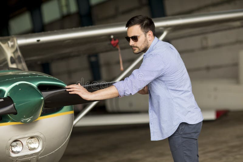 Young Pilot Checking Ultralight Airplane before Flight Stock Image ...