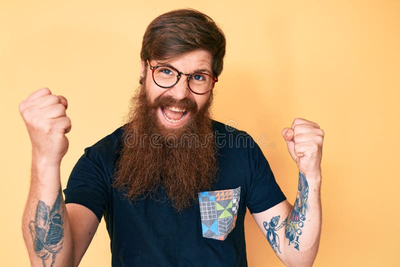 Handsome Young Red Head Man With Long Beard Wearing Casual Clothes And
