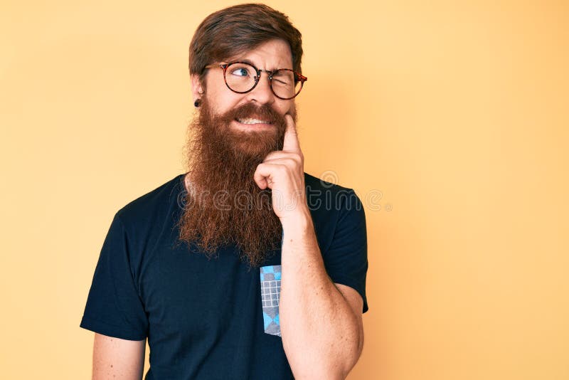 Handsome Young Red Head Man With Long Beard Wearing Casual Clothes And