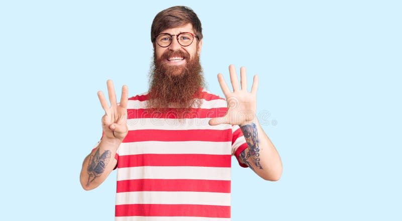 Handsome Young Red Head Man With Long Beard Wearing Casual Clothes