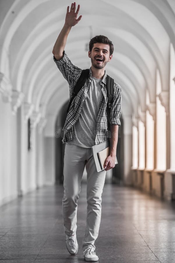 Handsome male student stock photo. Image of happy, notepad - 102385772