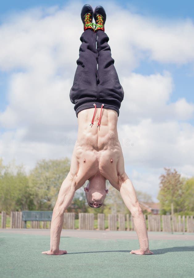 Handstand by muscualr man stock photo. Image of fitness - 53923042