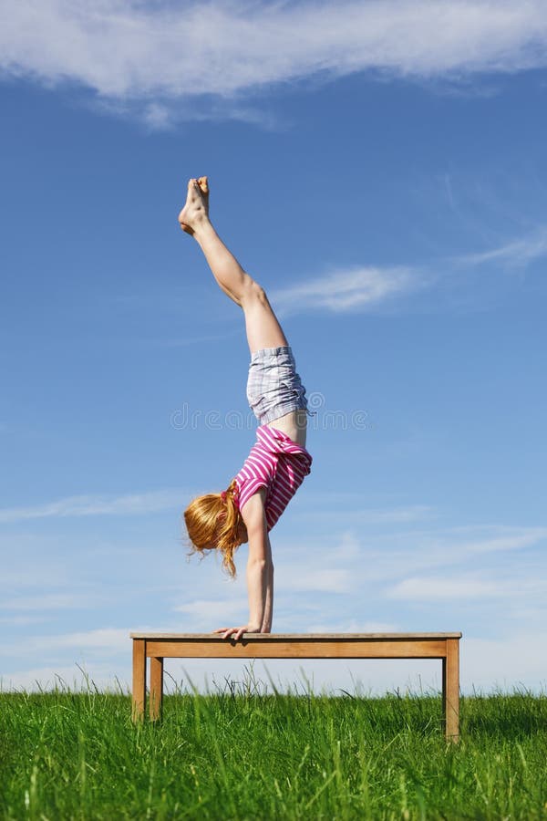 Girl doing handstand stock photo. Image of acrobatic - 35674702
