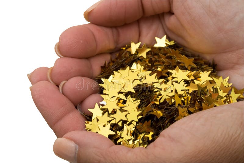 Handvoll Goldsterne stockbild. Bild von hände, erfolg - 10707609
