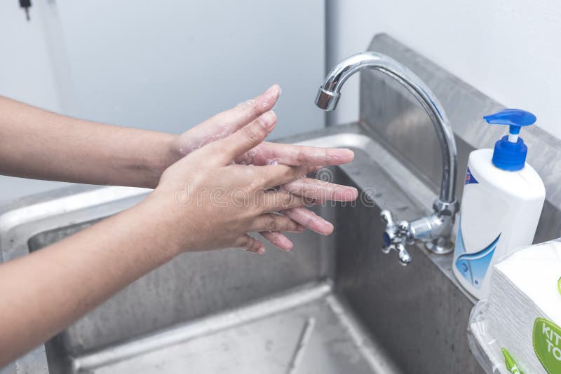 Handwashing Technique - Rubbing Hands Together with Interlaced Fingers ...