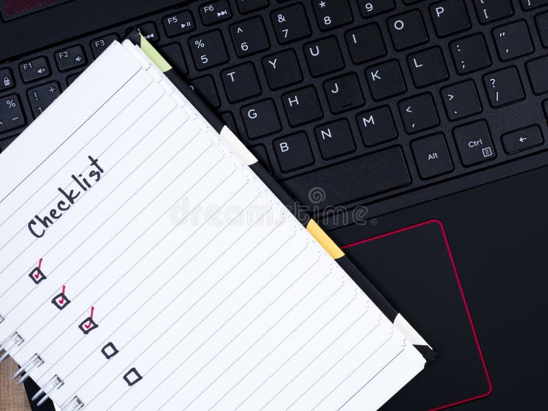 Handwriting Checklist on Blank Notebook with Laptop Keyboard Stock ...