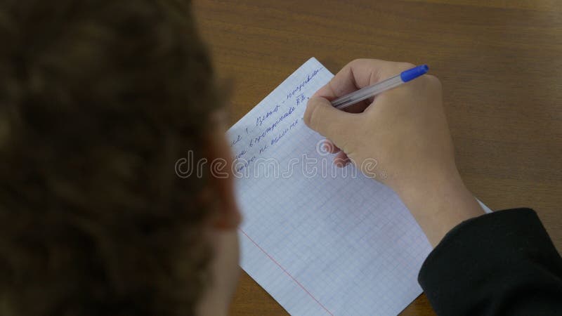 Handwriting, Hand Writes a Pen on Paper. Man Writes a Text on Paper ...