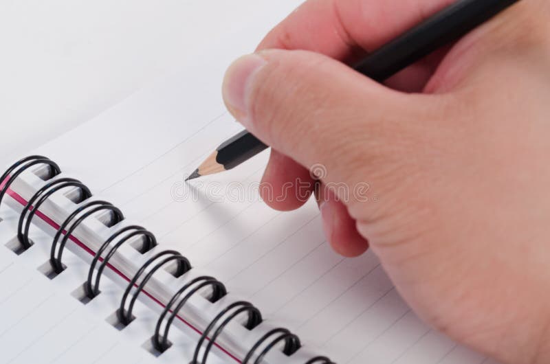 Handwriting with Pencil on the Notebook Stock Photo - Image of hand ...
