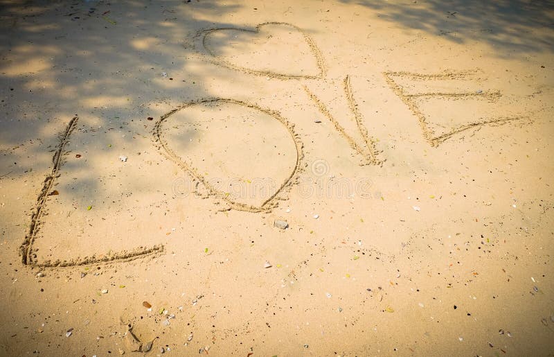 Handwriting Text LOVE on Sand, with Color Effect Stock Photo - Image of ...