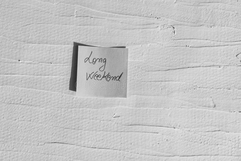 Handwriting Text on Memo Post Reminder. Long Weekend on Paper, on White ...