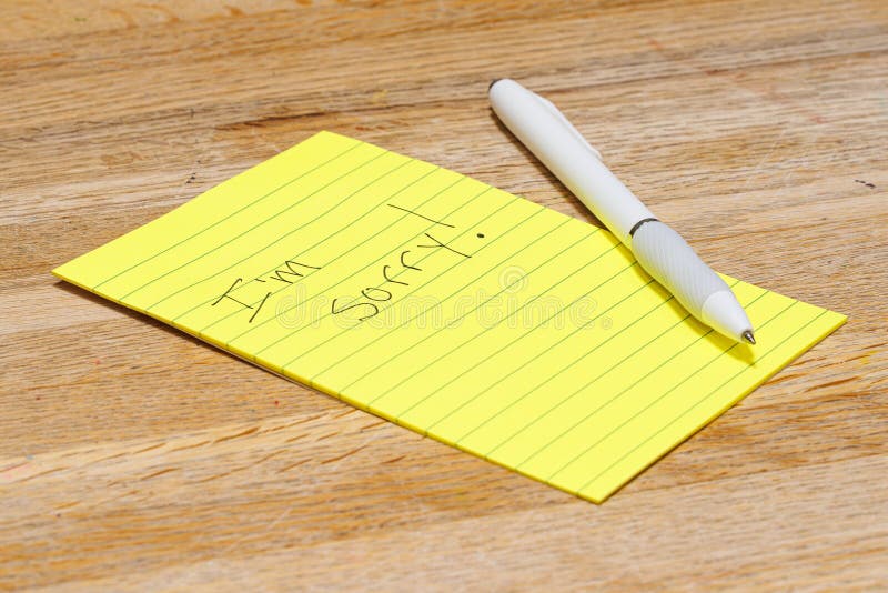 Handwritten Note Saying "I M Sorry" with Pen and Yellow Pad Stock Photo ...