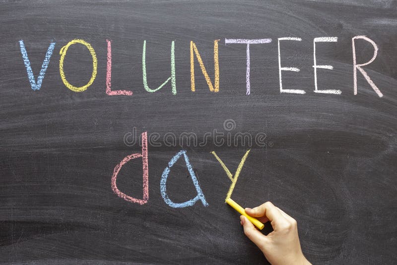 Handwritten Text on a Chalkboard `volunteer Day`. Stock Image - Image ...