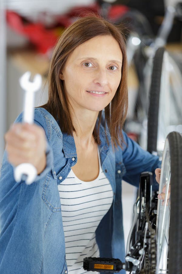 Handy Female Working on Bicycle Wheel Stock Image - Image of adjusting ...