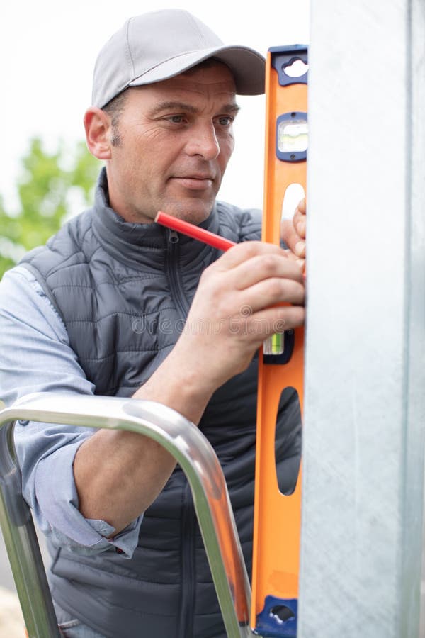 Handy Man Checking Site Outdoors Stock Image - Image of portrait, iris ...