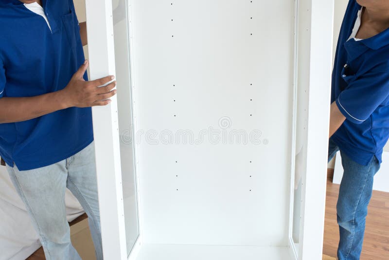 Handy Man Install the Furniture Stock Photo - Image of assembling ...
