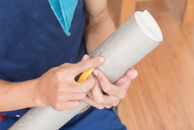 Handy Man Preparing Wallpaper Stock Photo - Image of lines, interior ...