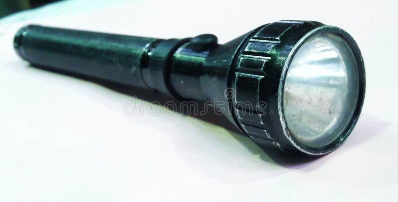 Handy LED torch in hand stock photo. Image of electrical - 25653538