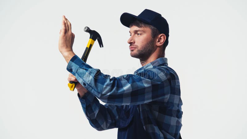 Handyman in Cap Holding Hammer Isolated Stock Photo - Image of isolated ...
