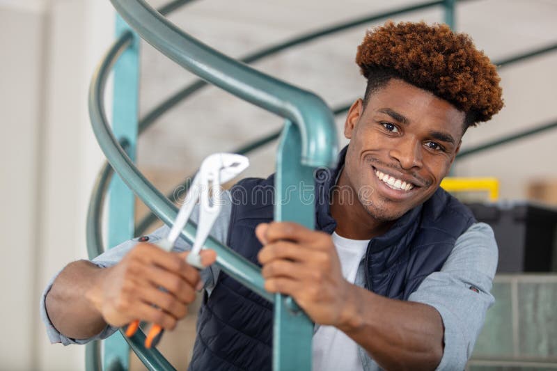 Handyman Fixing Staircase in Hospital Stock Image - Image of ...