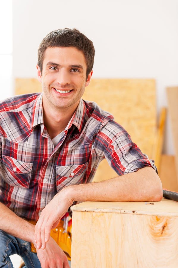 Handyman Relaxing after Work. Stock Photo - Image of camera, adult ...