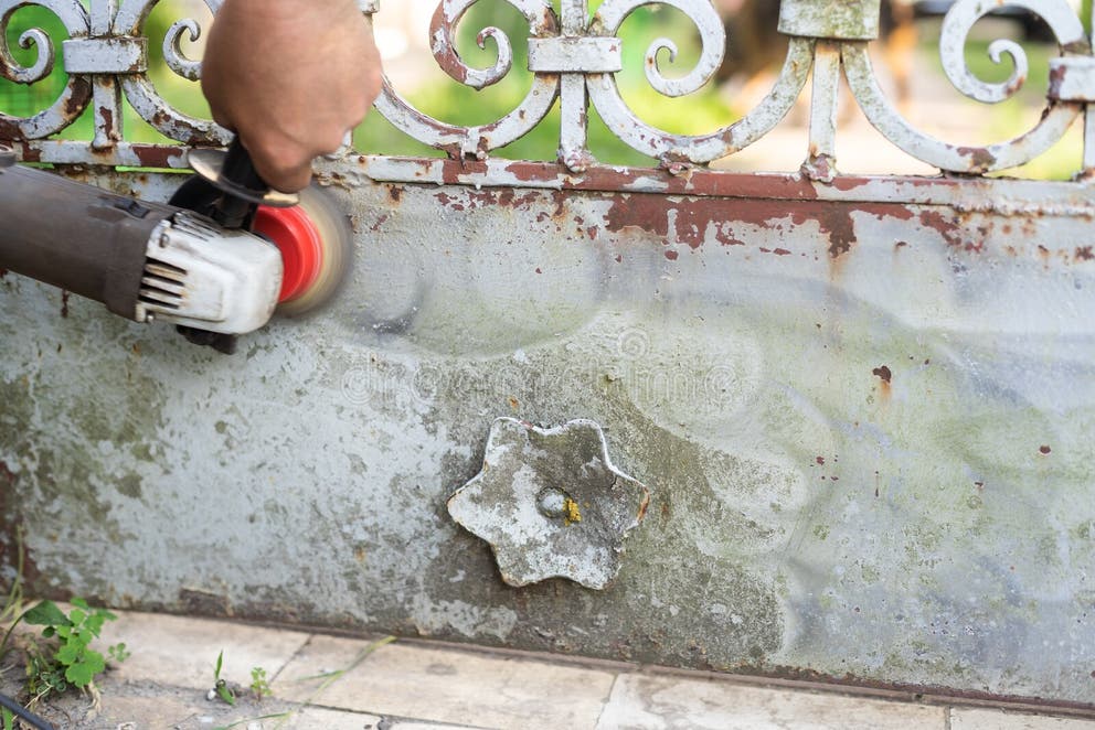 Handyman Scrape the Old Paint from Rusty Fence Stock Image - Image of ...