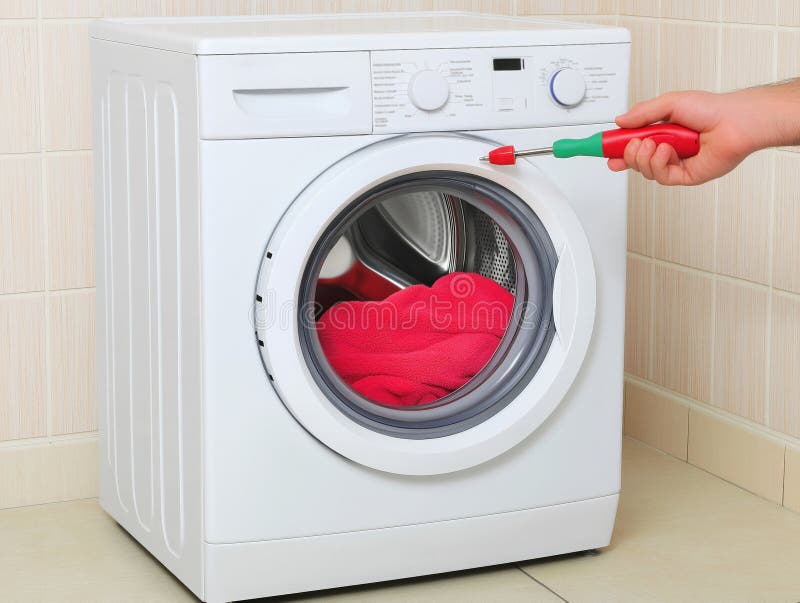 Handyman with Screwdriver in Front of Washing Machine Stock ...
