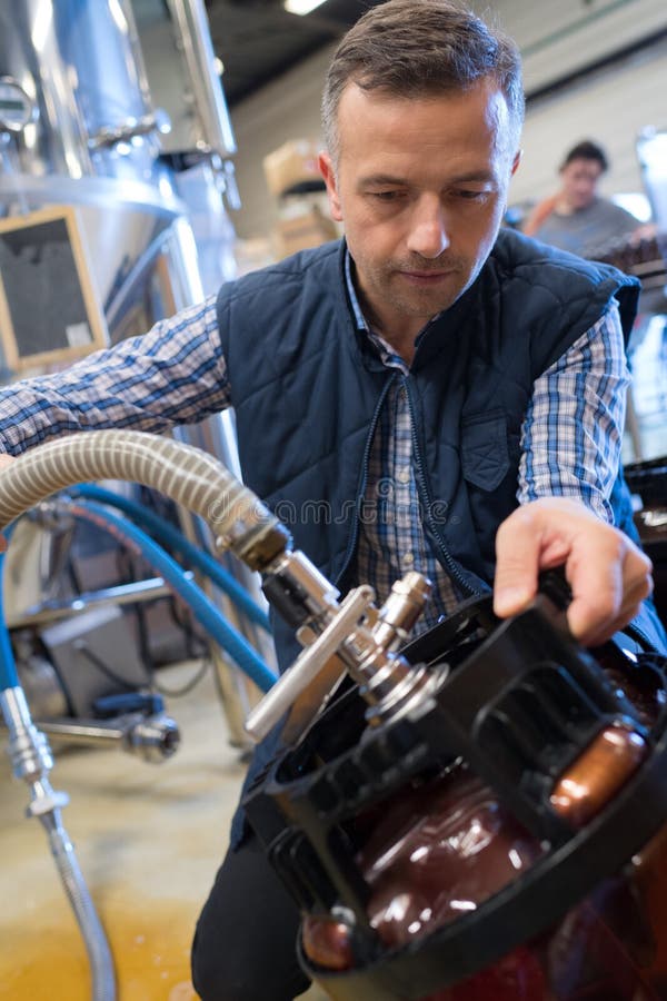 Handyman Selecting Product at Hardware Store Stock Image - Image of ...