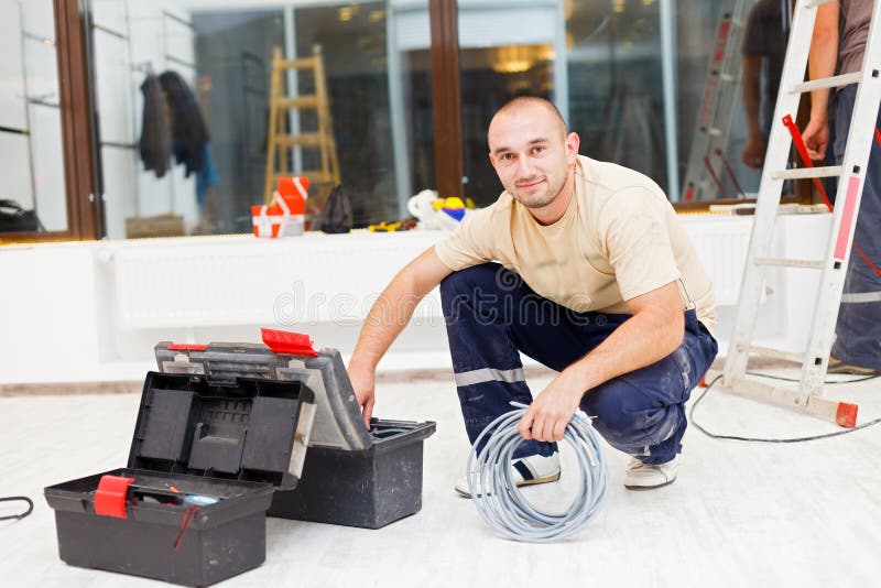 Handyman with Tool Box stock photo. Image of industrial - 56059414