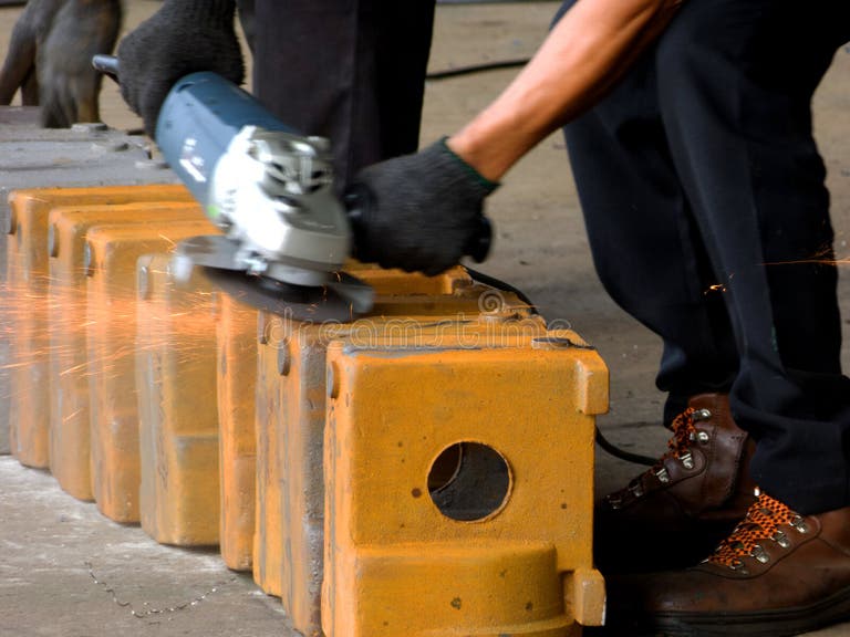 Handyman Use Grinder at Work Stock Image - Image of hand, gloves: 24261671