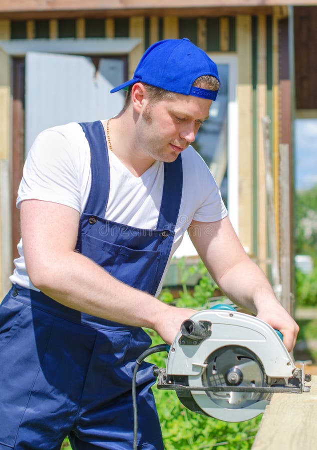 Handyman stock photo. Image of coveralls, renovation - 32575104