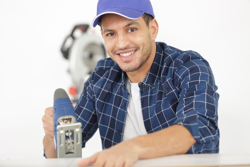 Handyman Using Jigsaw for Carpentry Work Stock Image - Image of ...