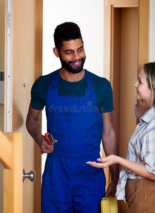 Handyman Visiting Female Client Stock Photo - Image of handyman ...