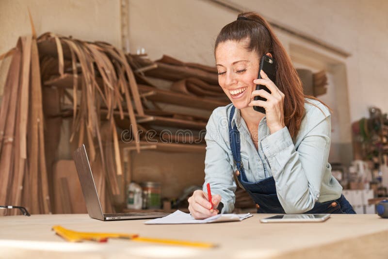 Handyman Woman Using Cell Phone in Customer Service Stock Image - Image ...